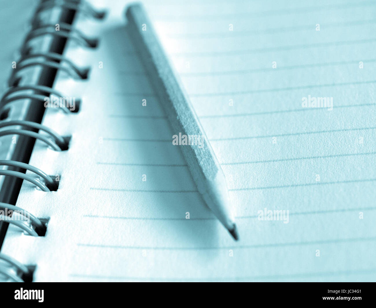 Notebook note pad page with pencil - cool cyanotype Stock Photo - Alamy