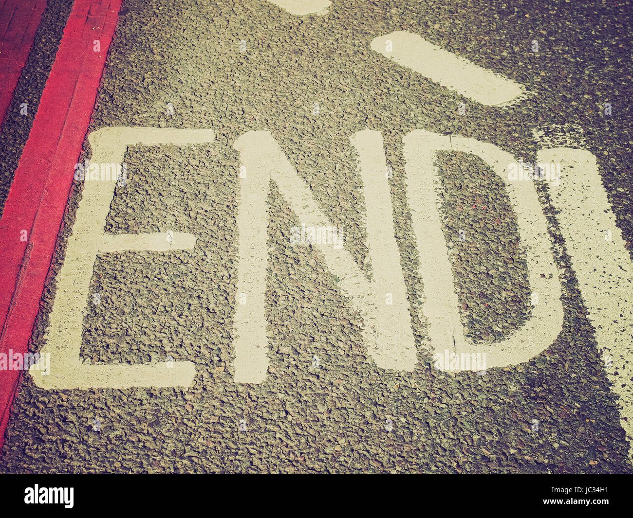 Vintage retro looking Sign of end of bicycle lane Stock Photo - Alamy