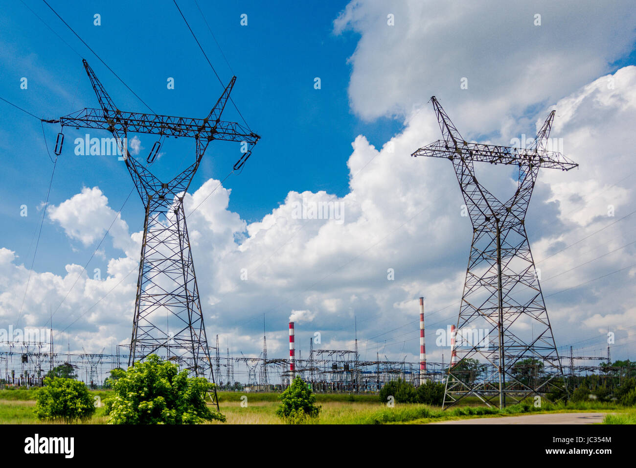 Pylon and transmission power line in summer day Stock Photo - Alamy