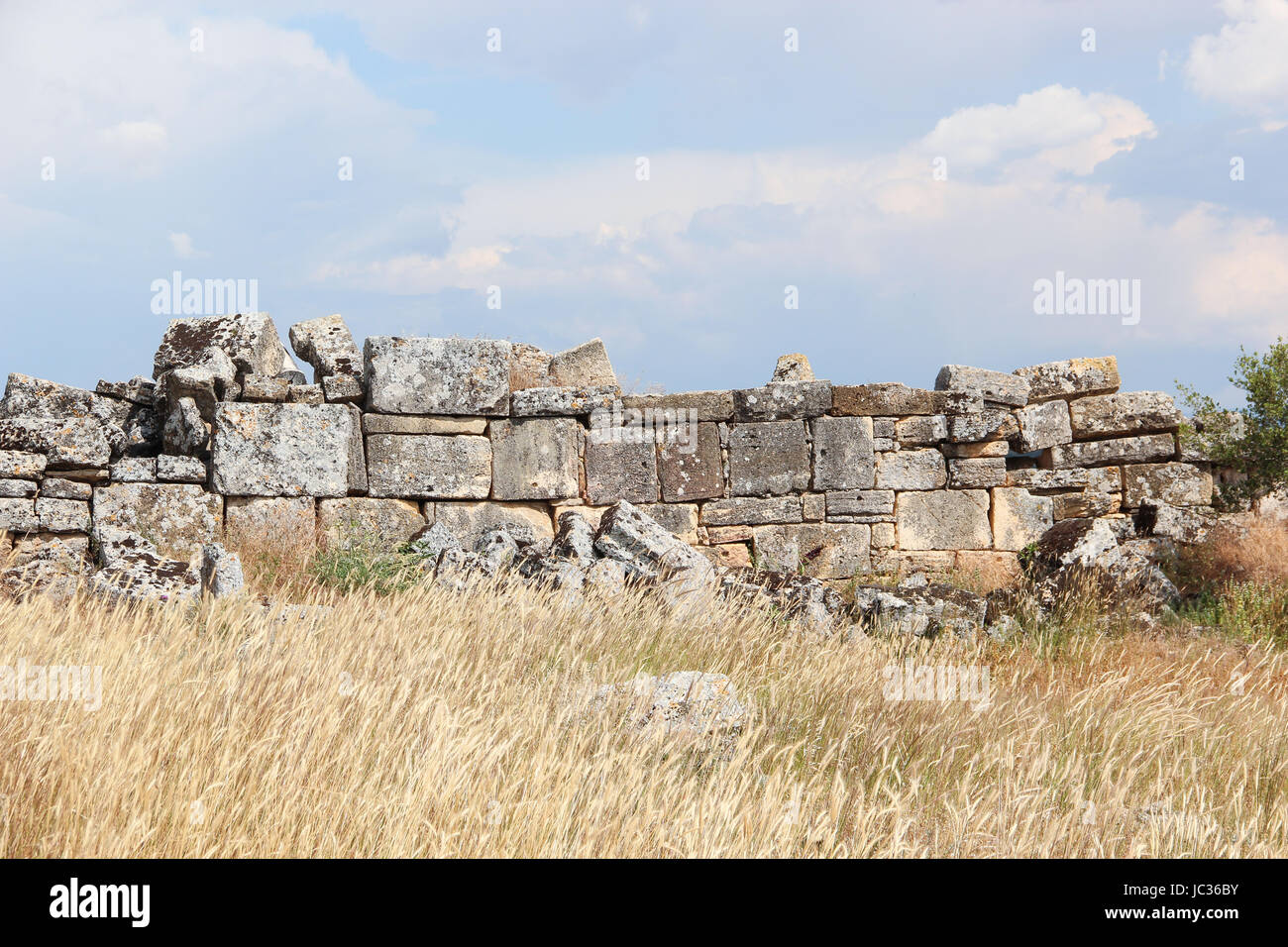 Landscape with a view of the stone Wall of the ancient city of ...