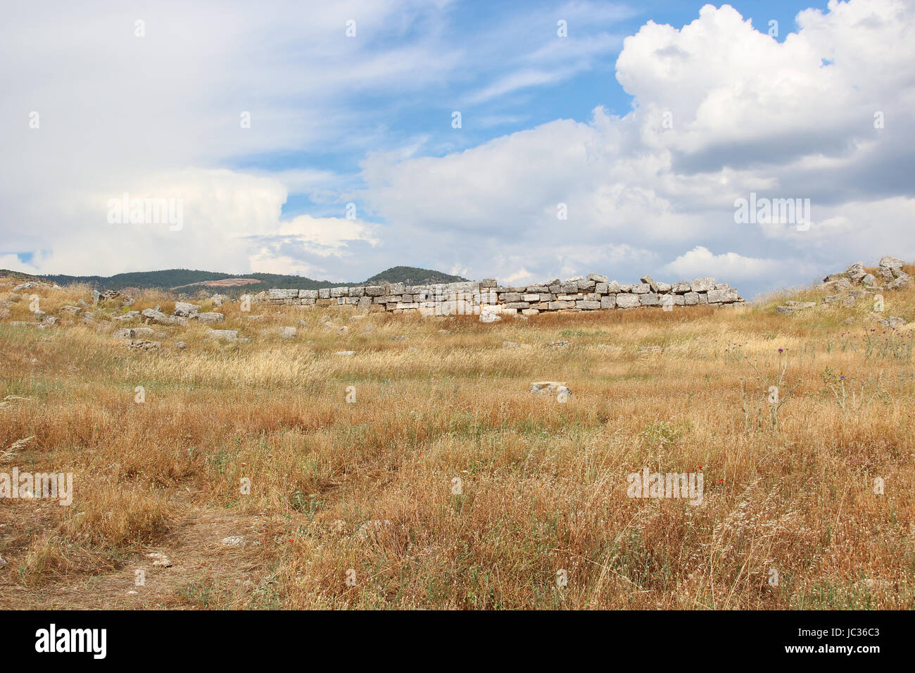 Landscape with a view of the stone Wall of the ancient city of ...