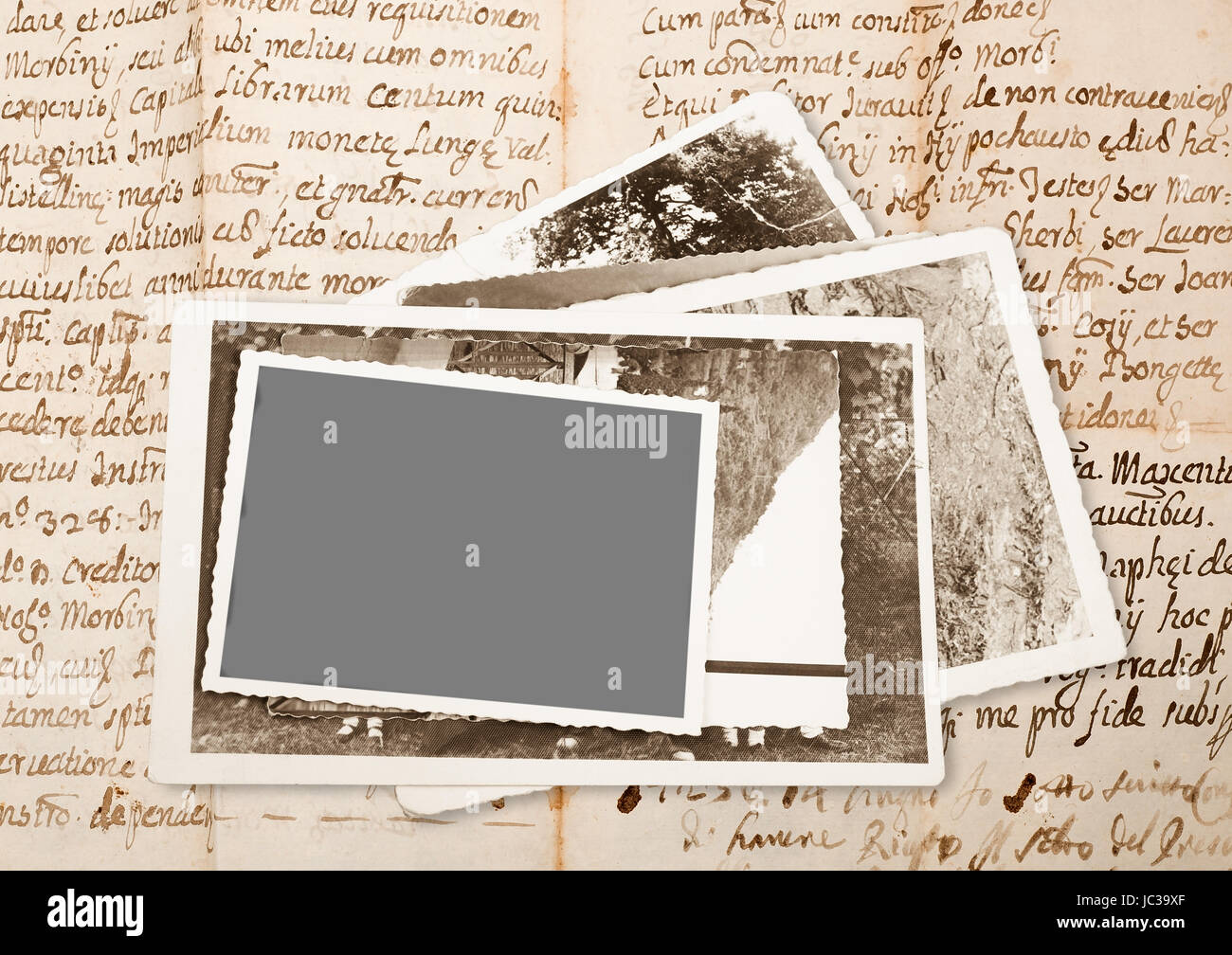 old pictures frame on old manuscript Stock Photo - Alamy