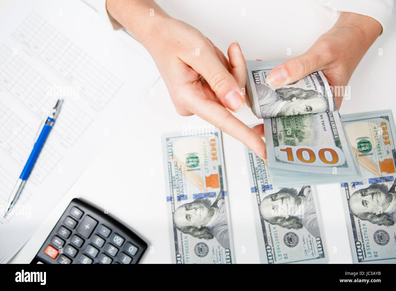 Hands counting money, close up Stock Photo - Alamy