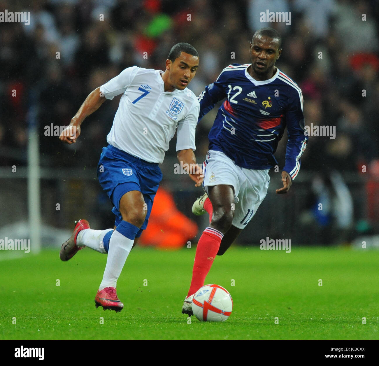 THEO WALCOTT & ERIC ABIDAL ENGLAND V FRANCE WEMBLEY STADIUM LONDON ...