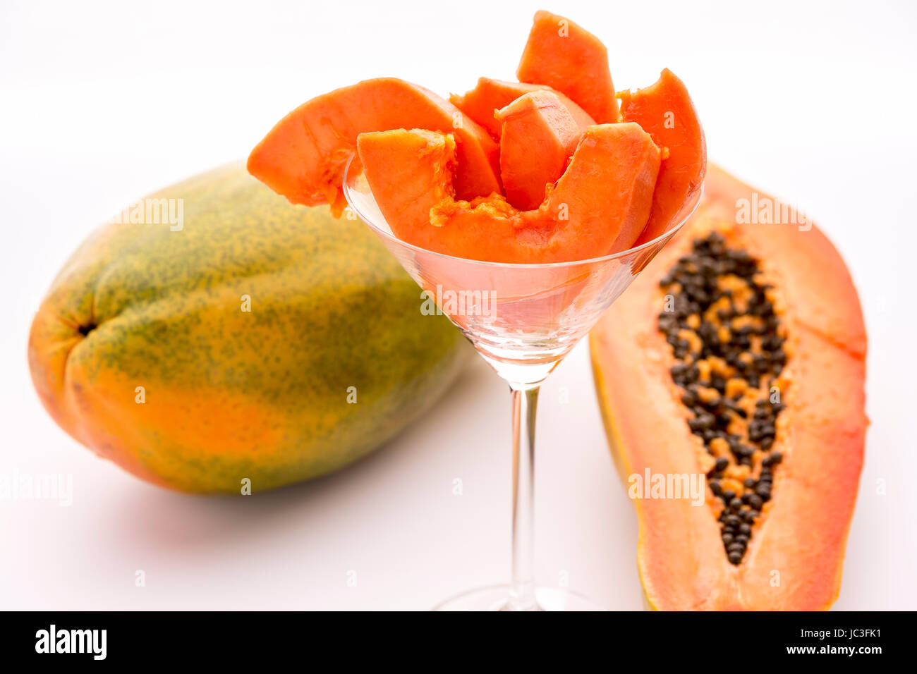 Fruit pulp of the papaya assorted in a cocktail glass. The papaya is a ...