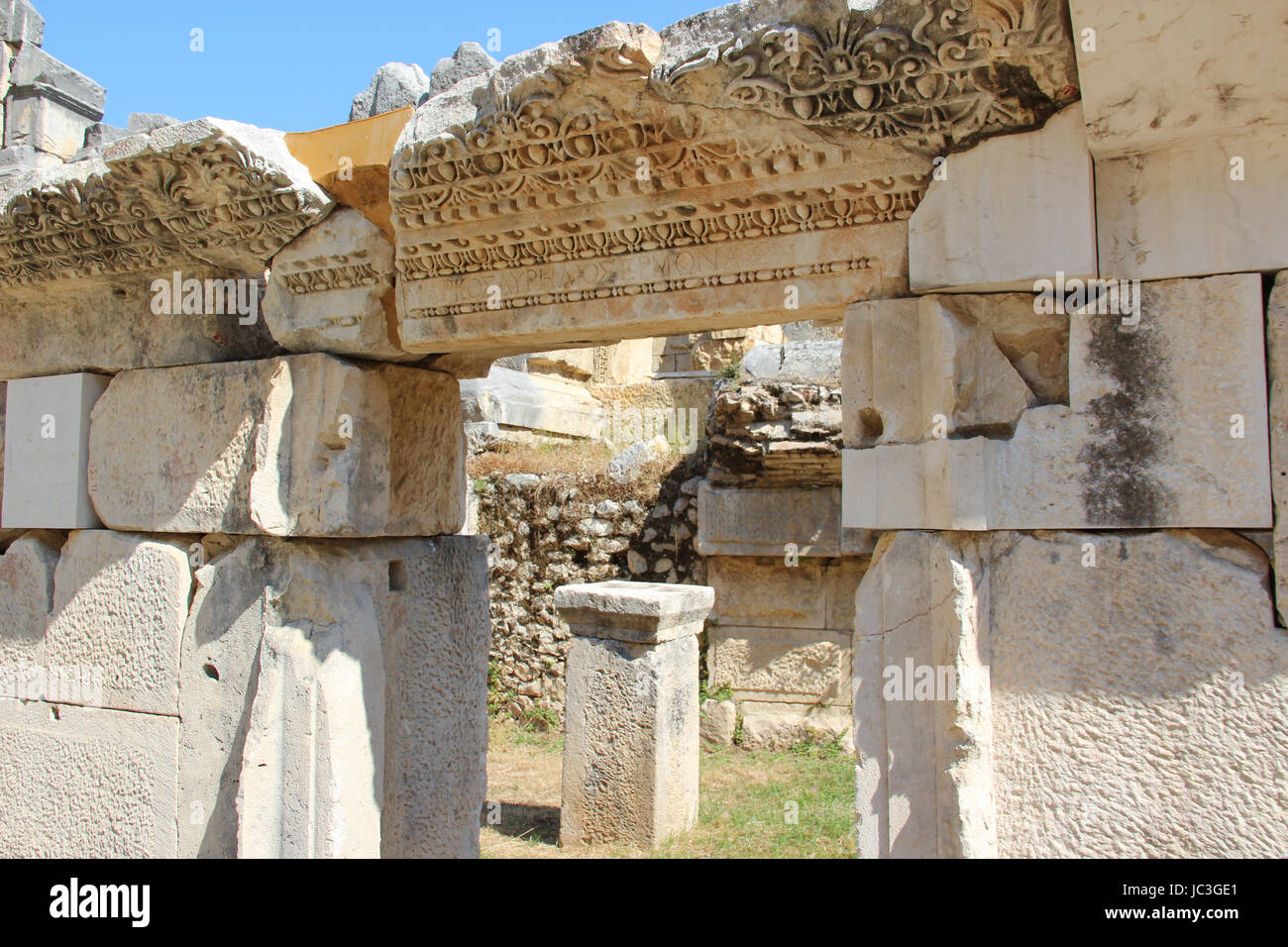 Antique carved marble gate in amphitheatre in Myra Lycian Stock Photo ...