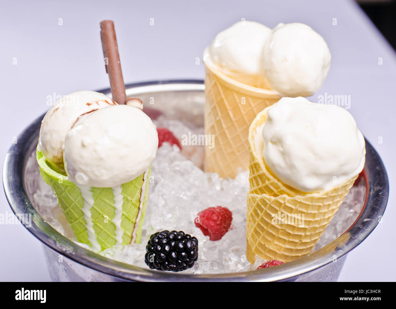 Ice cream in an ice bucket and fruit Stock Photo - Alamy