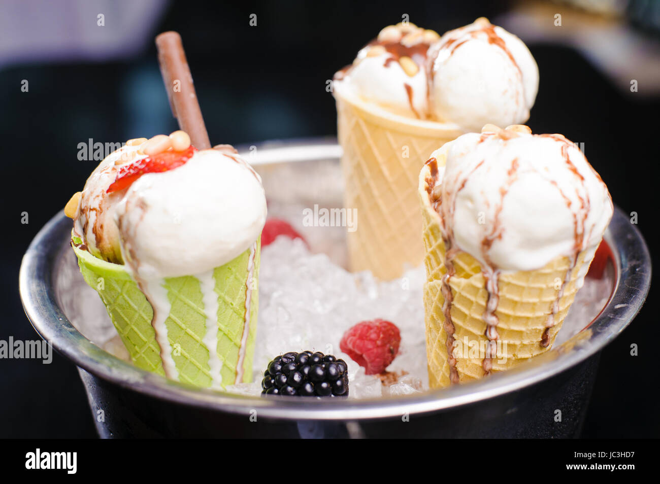 Ice cream in an ice bucket and fruit Stock Photo - Alamy