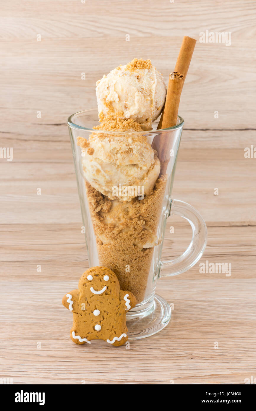 Scoops of homemade Gingerbread Ice Cream and Gingerbread crumbs in a ...