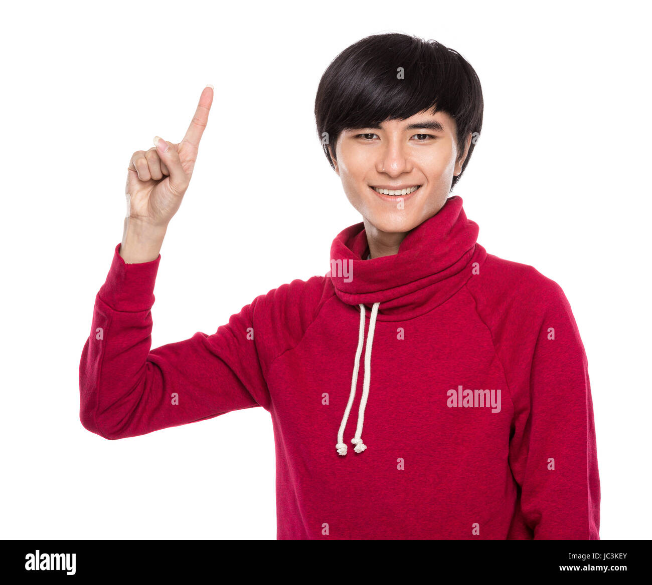 Asian young man with finger up Stock Photo - Alamy