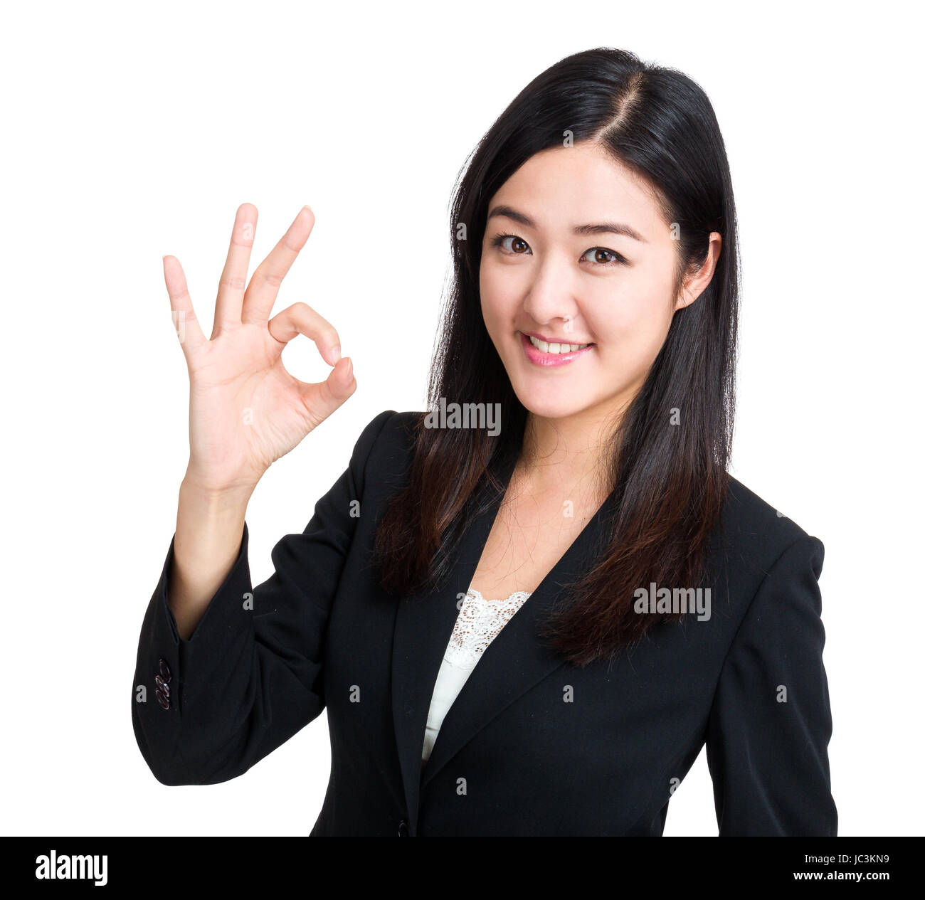 Business woman with ok sign Stock Photo - Alamy