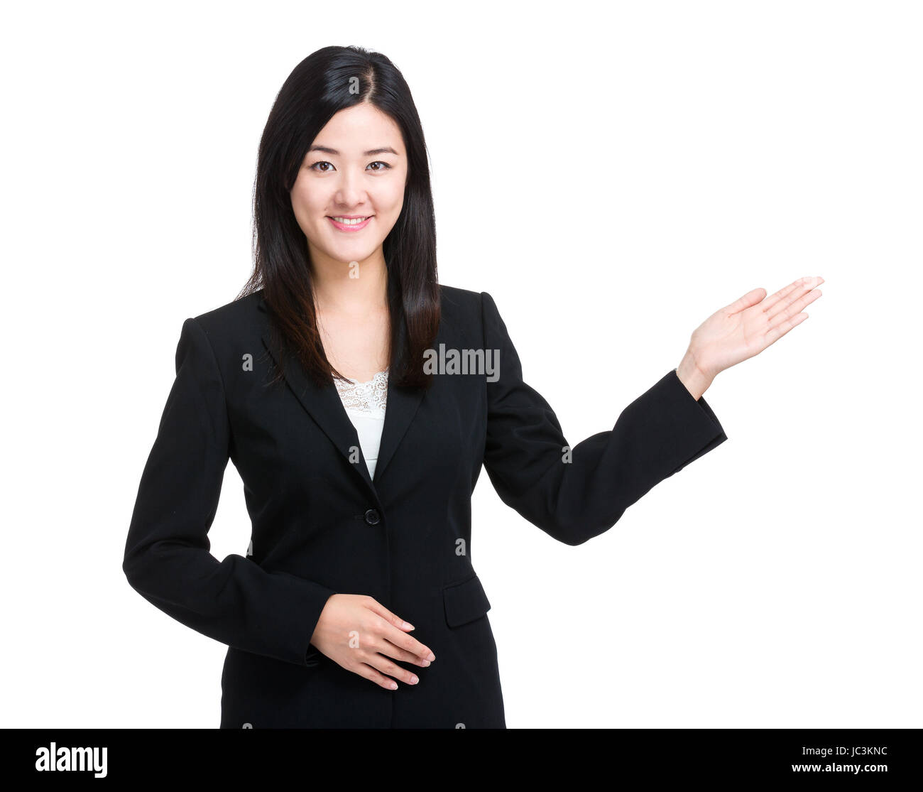 Businesswoman with hand presentation Stock Photo - Alamy