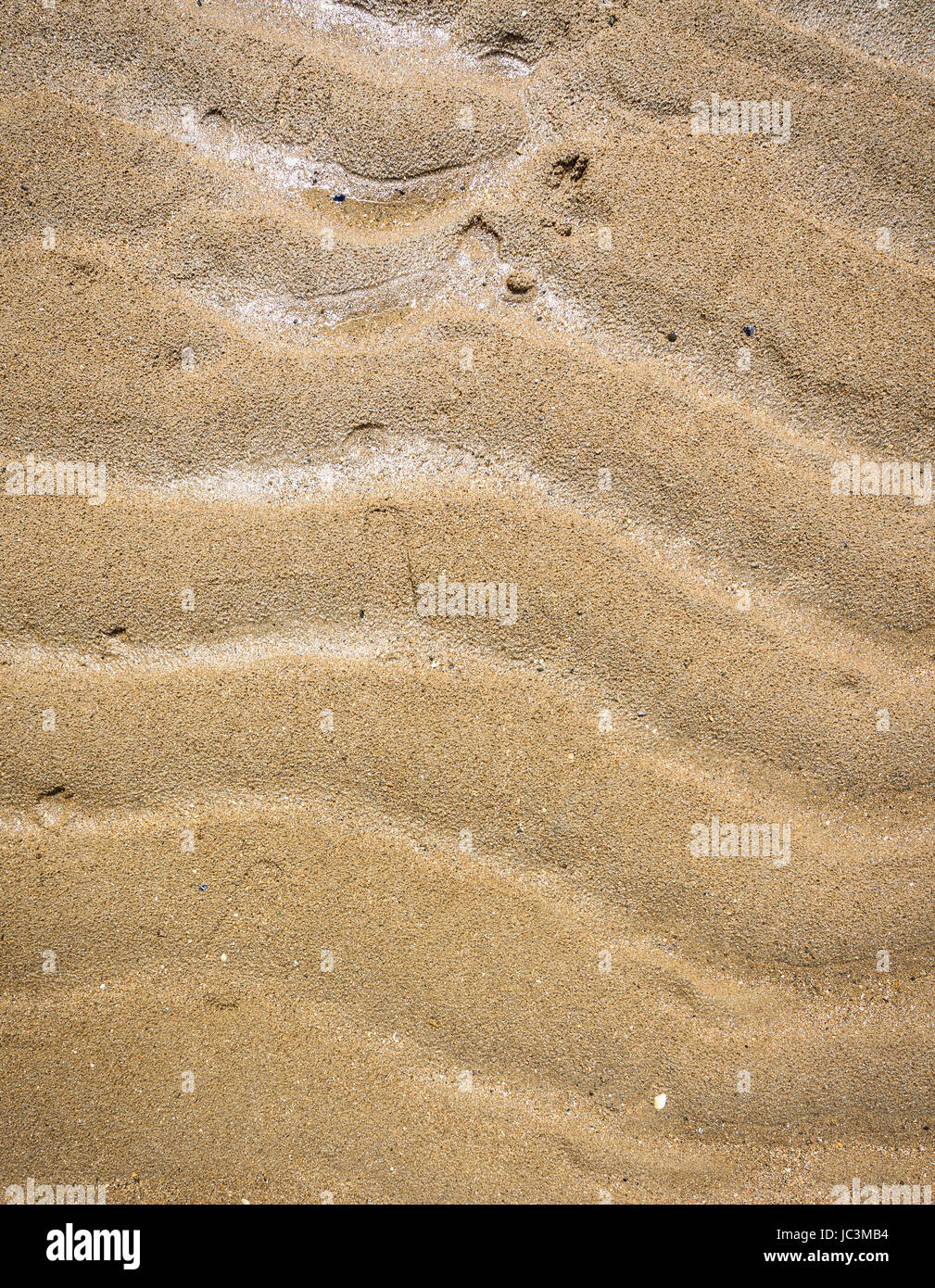 Natural wave pattern in sand on a beach texture. Graphic element of ...