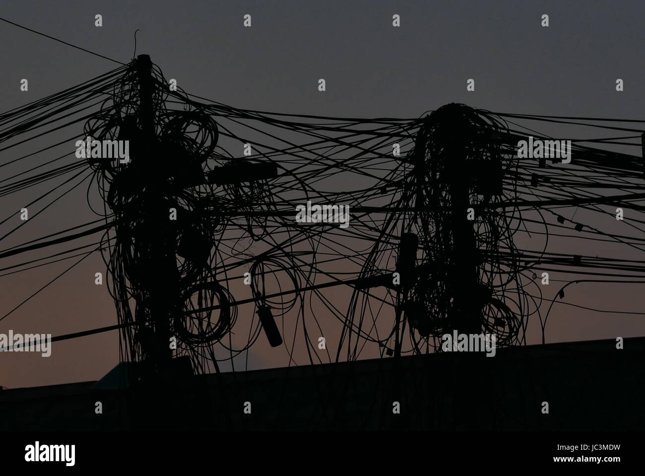Chaotic wiring on a pole in Katmandu Nepal.The confusion of electrical ...