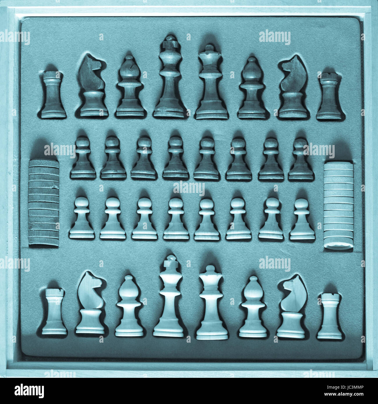 Chess game board with pieces - cool cyanotype Stock Photo - Alamy