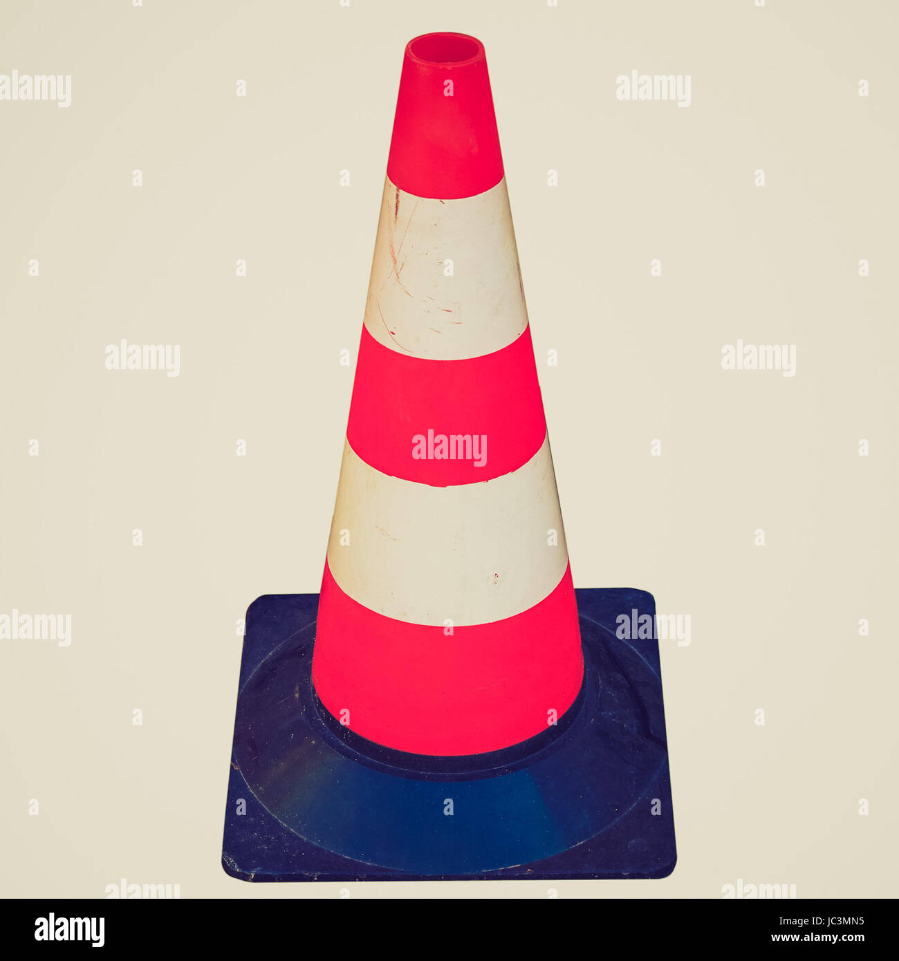 Vintage retro looking Traffic cone isolated over a white background ...