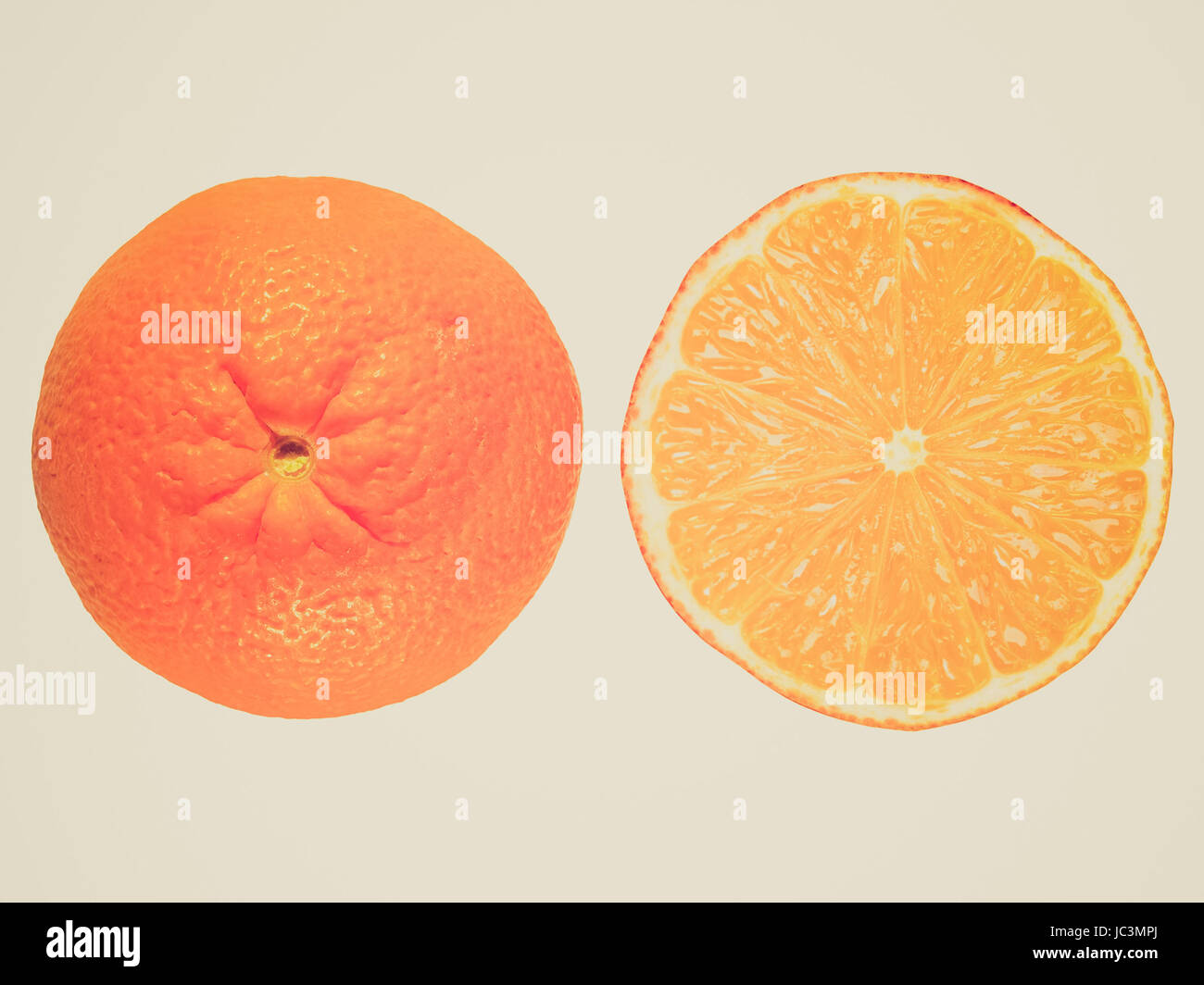 Vintage retro looking Orange fruit in and out view isolated over white ...