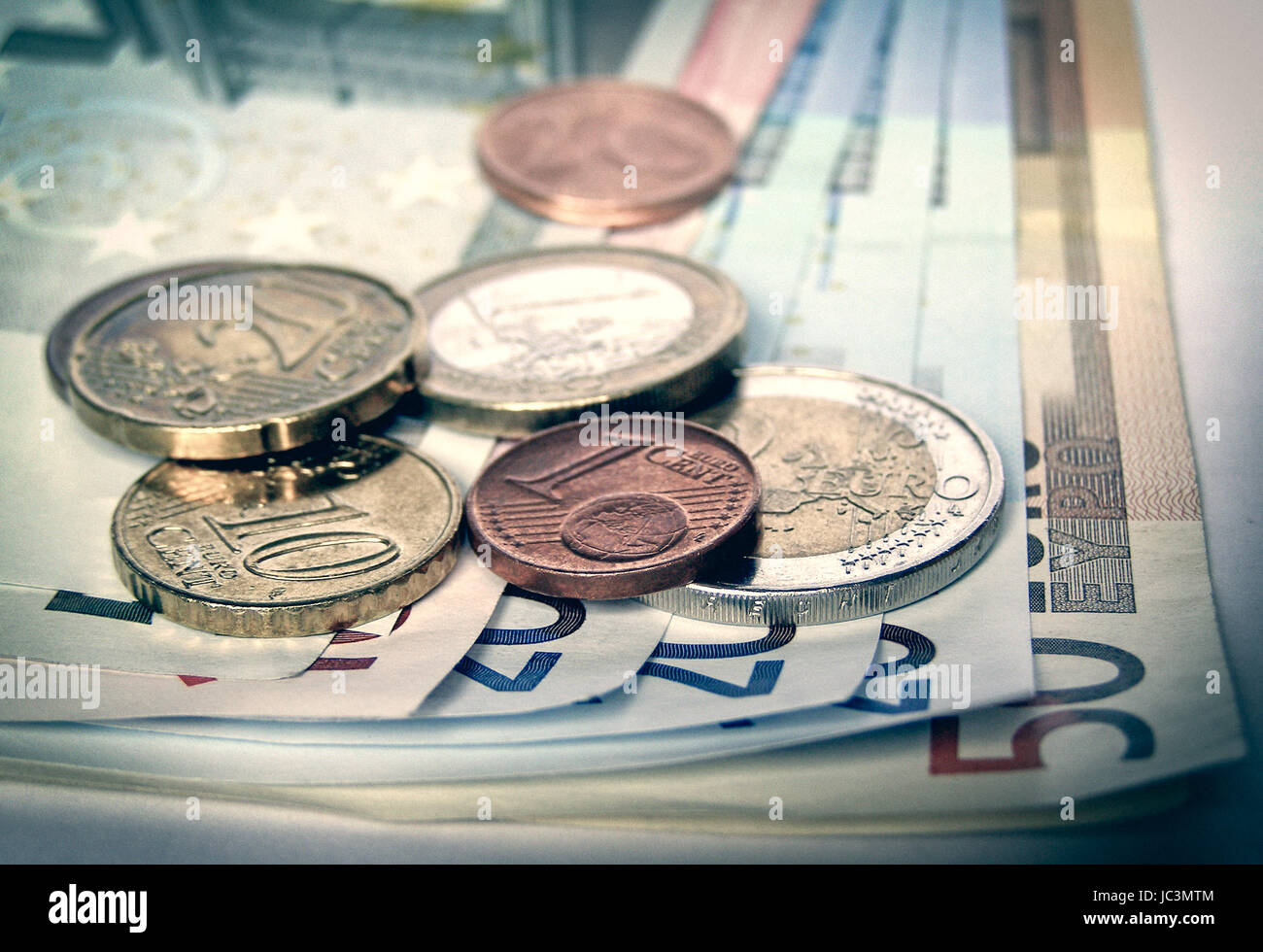 Vintage looking Euro banknotes and coins picture Stock Photo - Alamy