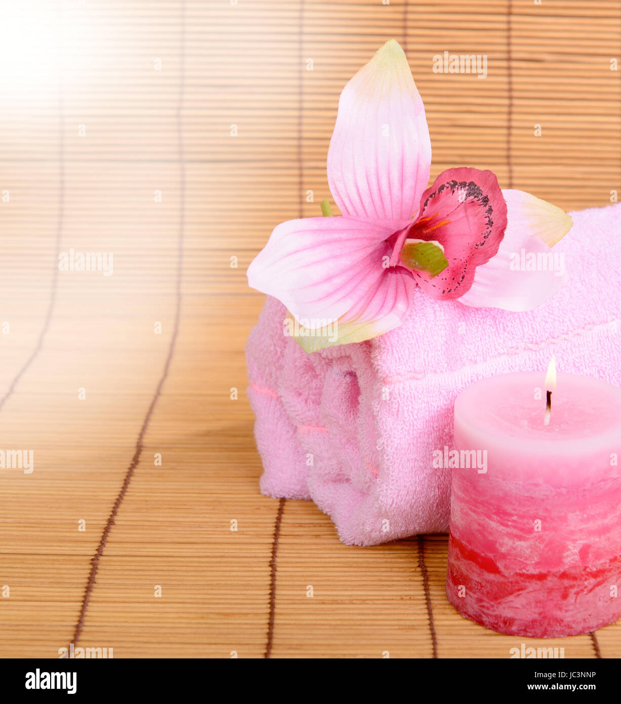 Spa setting in pink tone isolated in white Stock Photo - Alamy