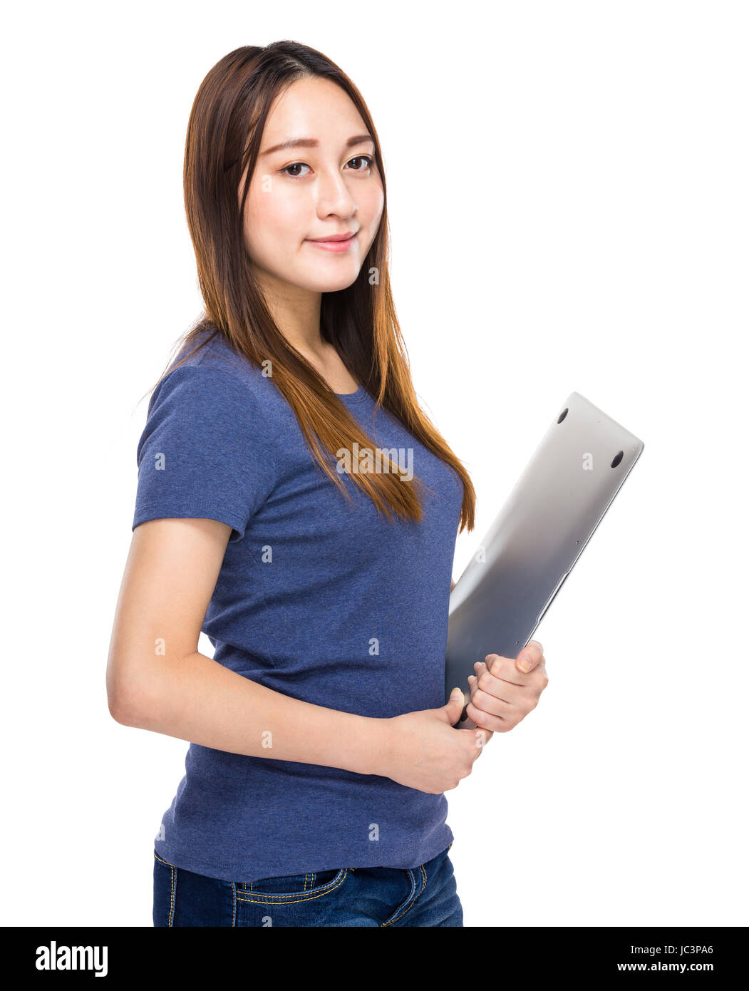 Indonesian mixed race young woman hold notebook computer Stock Photo ...
