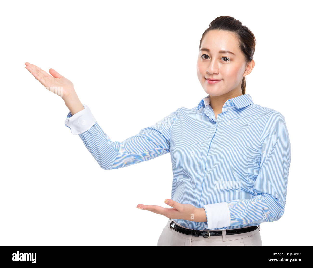 Indonesian businesswoman with hand presentation Stock Photo - Alamy