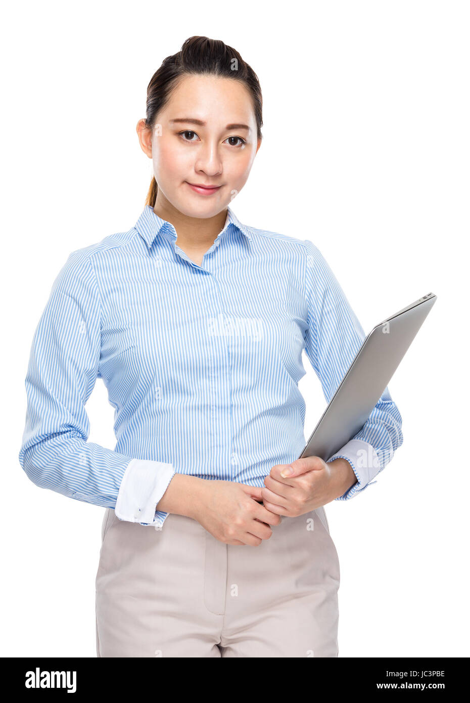 Indonesian business woman hold laptop computer Stock Photo - Alamy