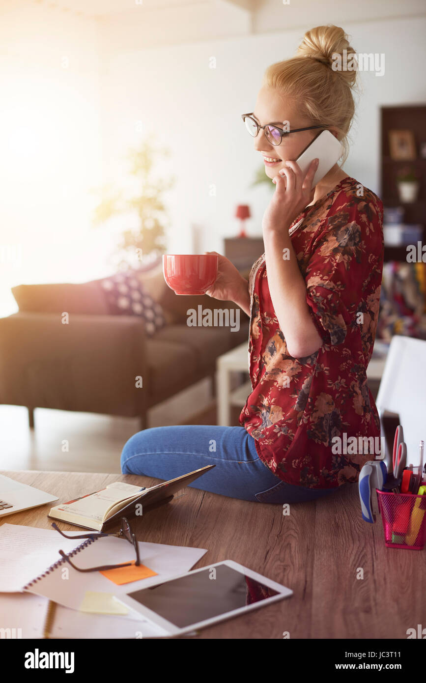 Busy afternoon in small office Stock Photo - Alamy