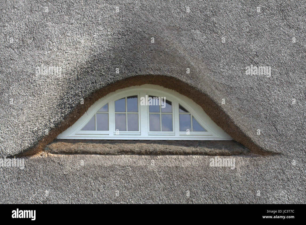 Windows in thatched roof hi-res stock photography and images - Alamy