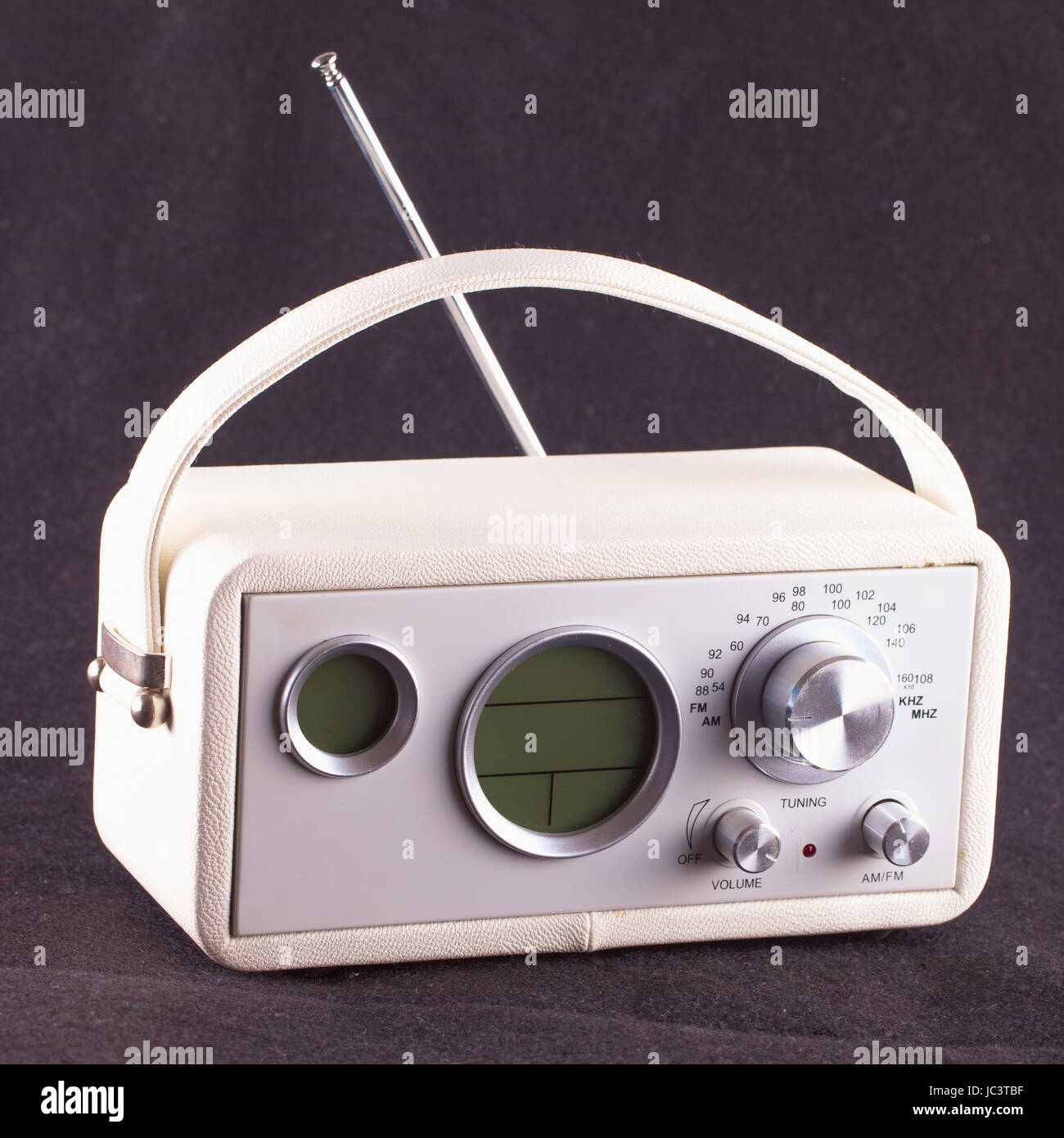 White vintage radio over black tissue background Stock Photo - Alamy