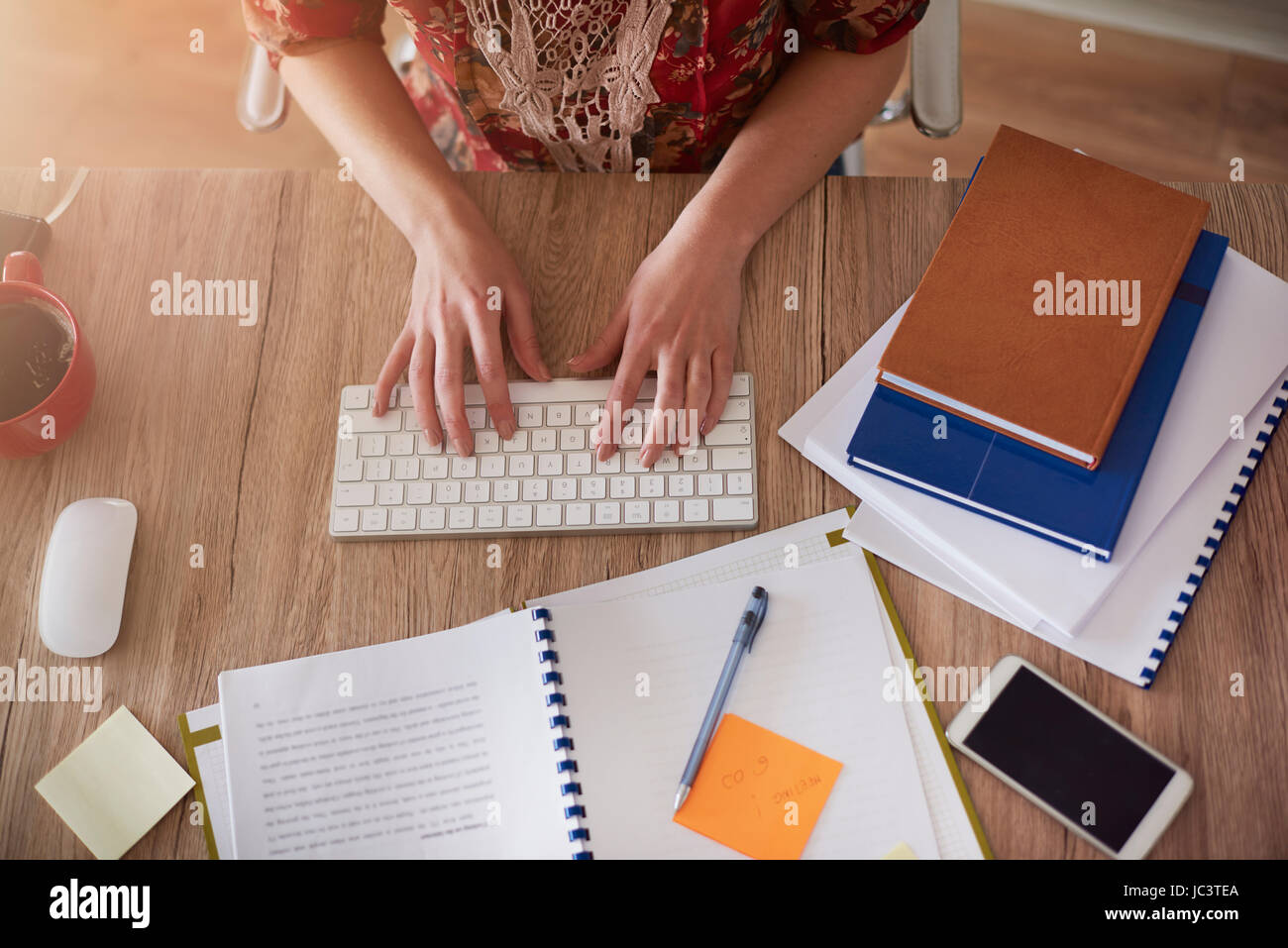 Desk full of office accessories Stock Photo - Alamy
