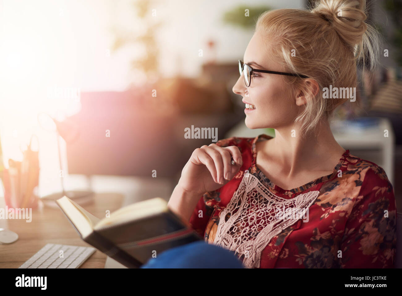 Woman thinking home future hi-res stock photography and images - Alamy