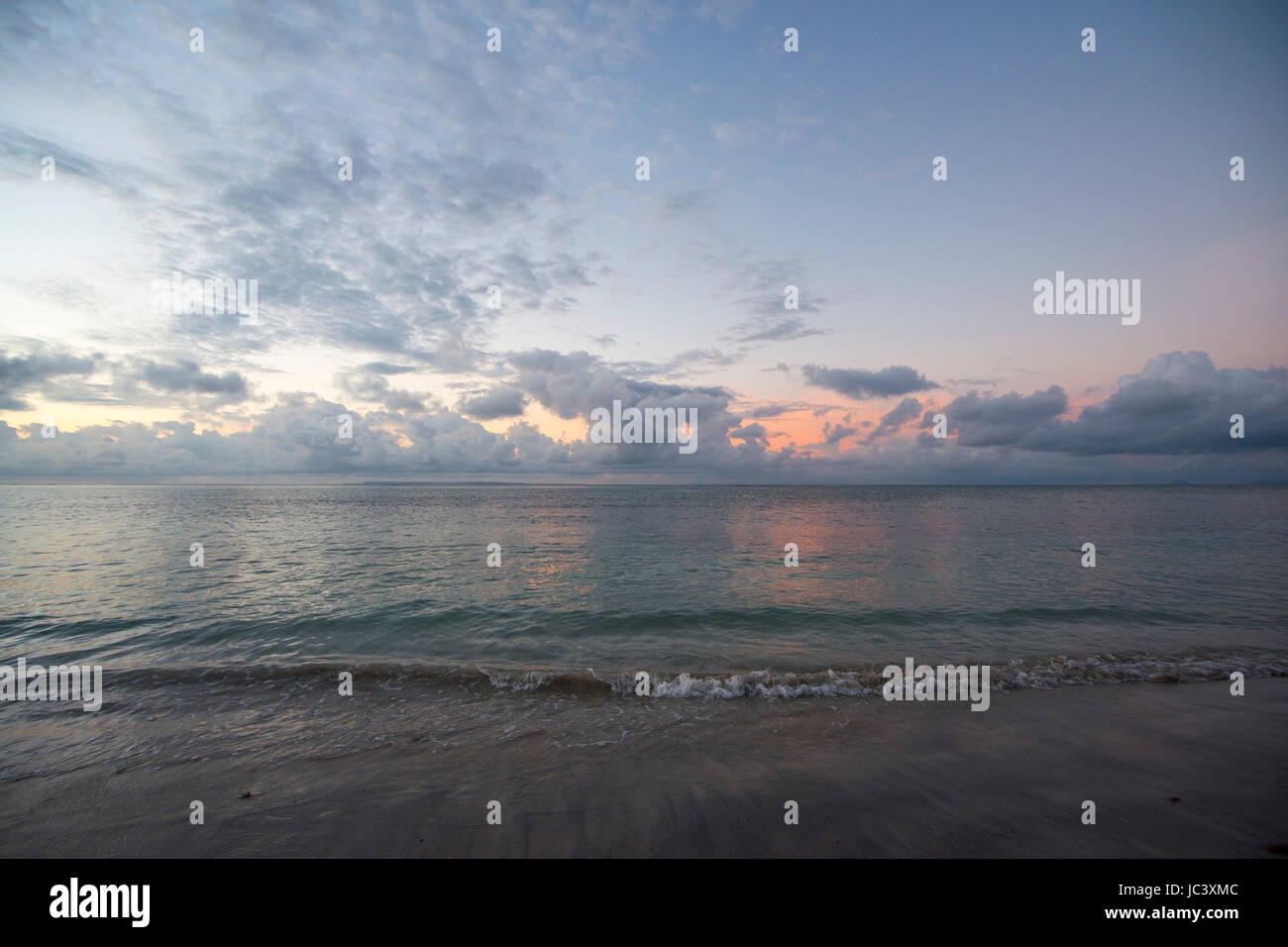 early morning at the beach Stock Photo - Alamy