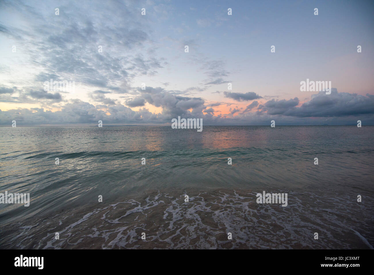 early morning at the beach Stock Photo - Alamy