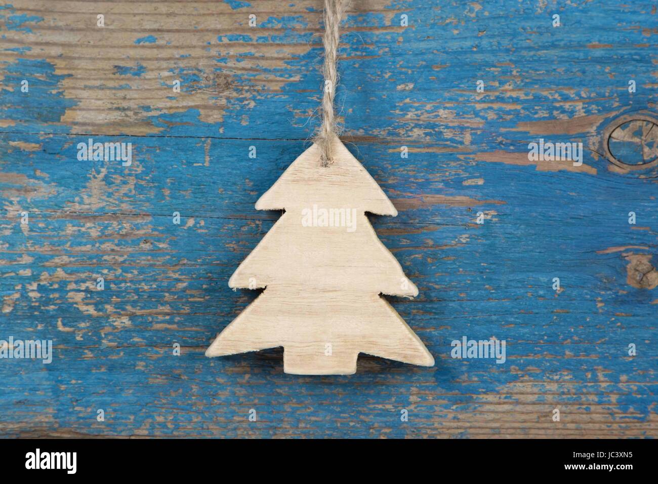 Top view of hanging pine tree on wooden background for christmas in ...