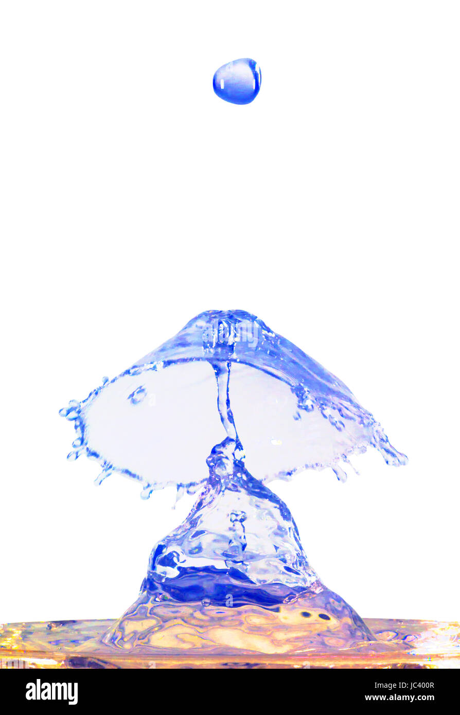 Colorful liquid splash isolated on white background closeup Stock Photo ...