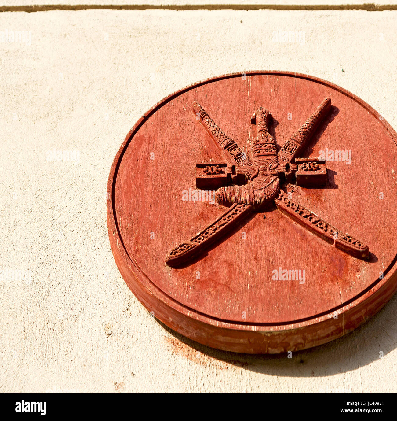 in oman the national emblem wood made and the wall Stock Photo - Alamy