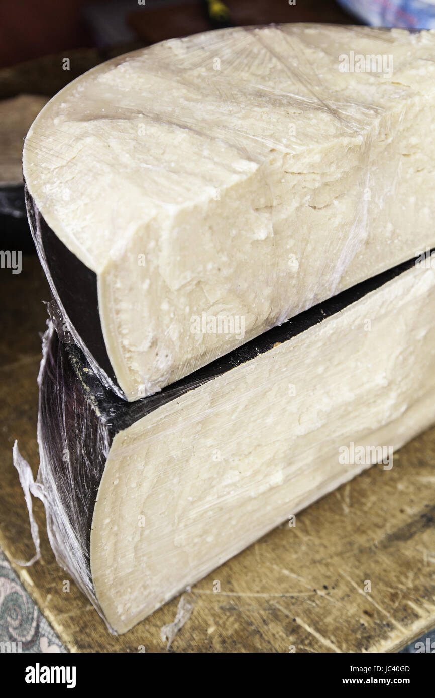 Broken cheese, detail of a dairy product Stock Photo - Alamy