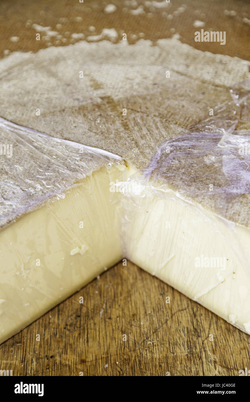 Broken cheese, detail of a dairy product Stock Photo - Alamy