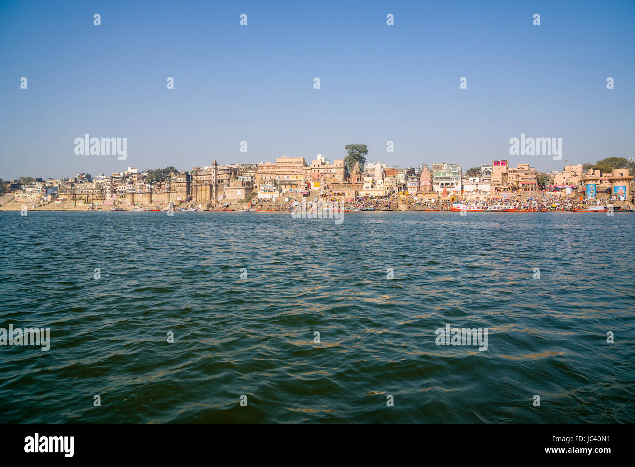 Panoramic view across the holy river Ganges on Dashashwamedh Ghat, Main ...
