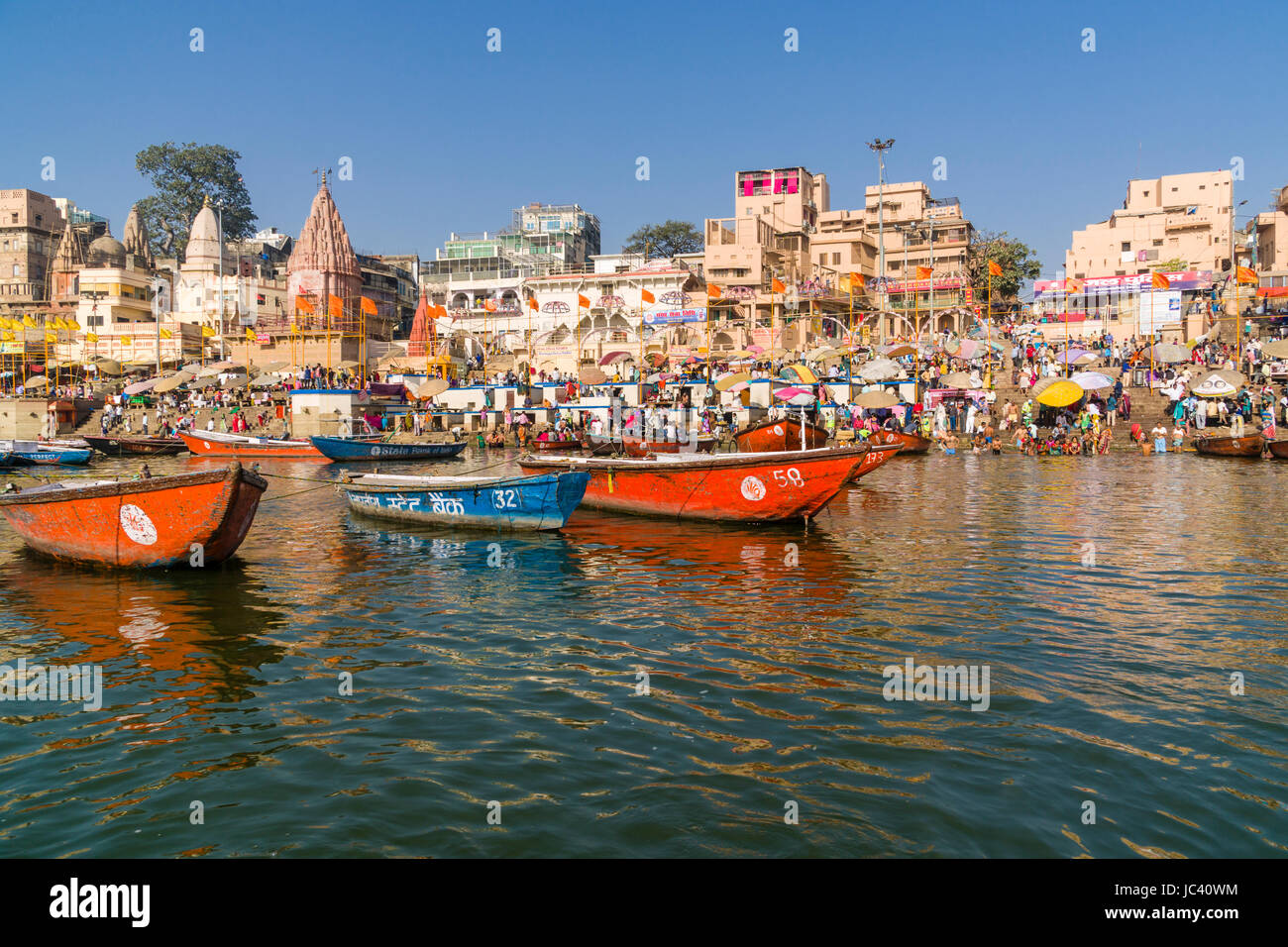 View across the holy river Ganges on Dashashwamedh Ghat, Main Ghat, in ...
