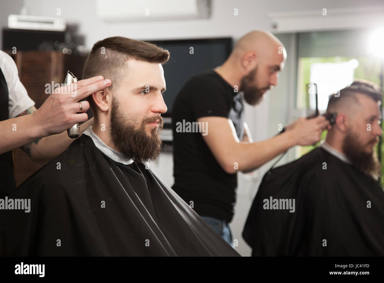 Hairdresser hair cut tattoo hi-res stock photography and images - Alamy