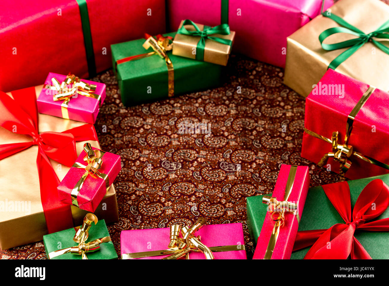 Multitude of plain presents grouped around a central void. All wrapped ...