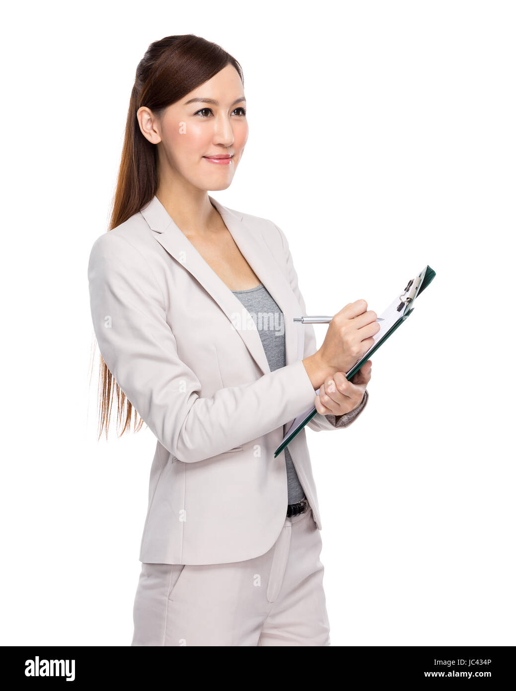 Secretary write on clipboard Stock Photo - Alamy