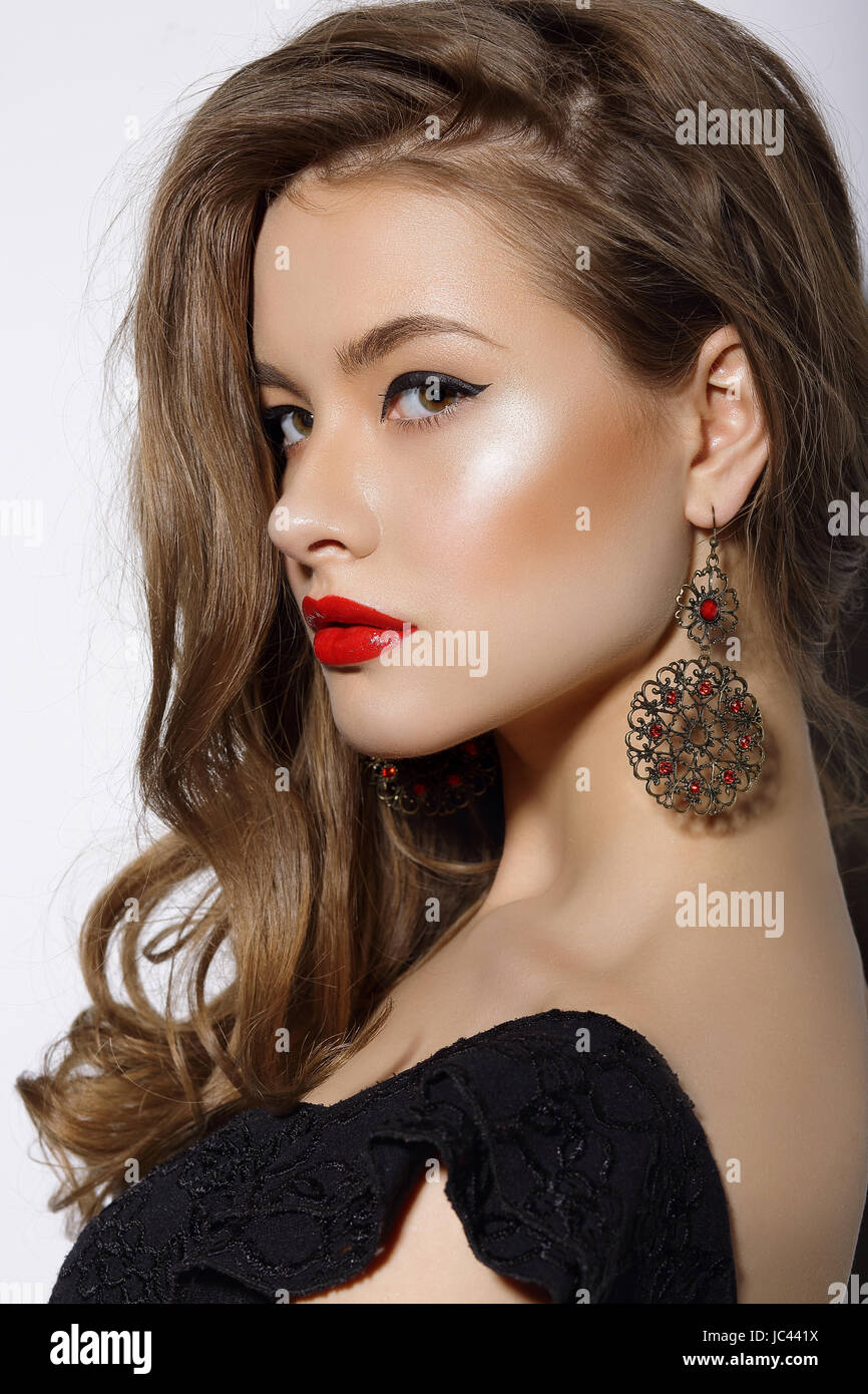 Profile of Respectable Classy Brunette with Earrings Stock Photo - Alamy