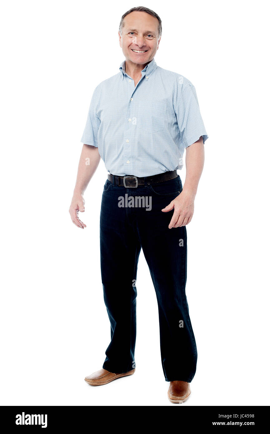 Full length portrait of a casual senior man standing Stock Photo - Alamy