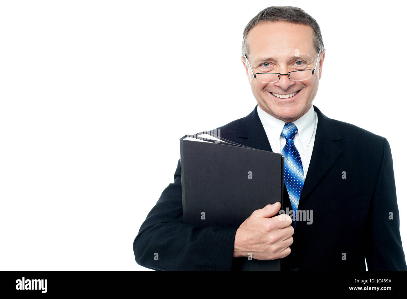 Handsome businessman carrying important files Stock Photo - Alamy