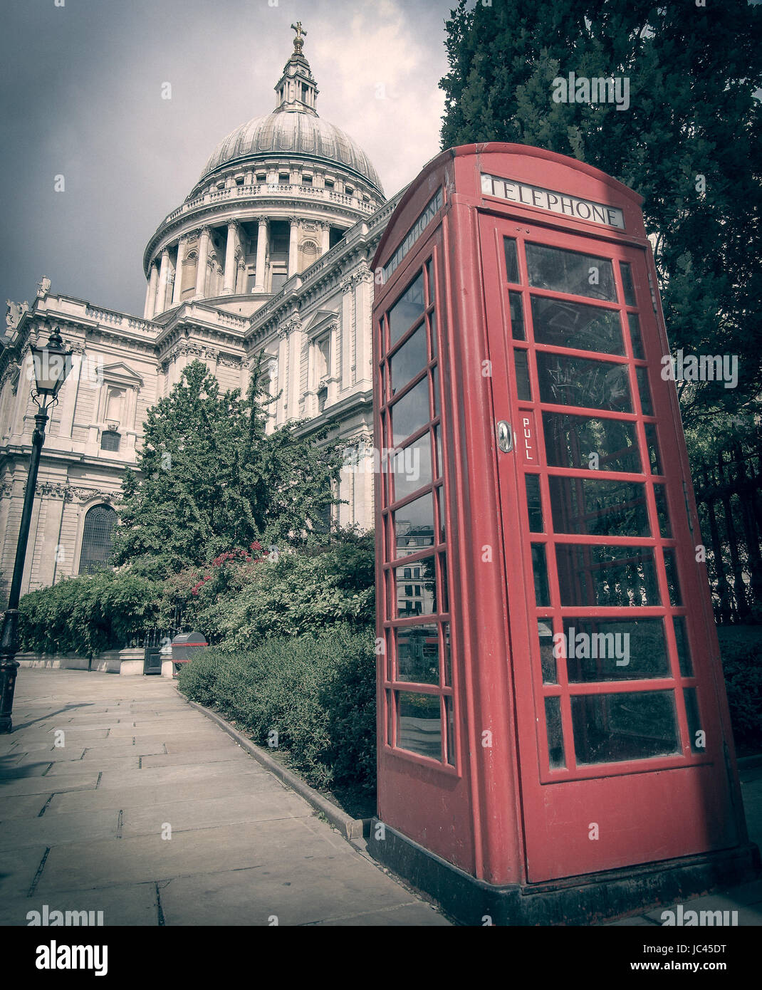 Vintage looking traditional red telephone hi-res stock photography and ...
