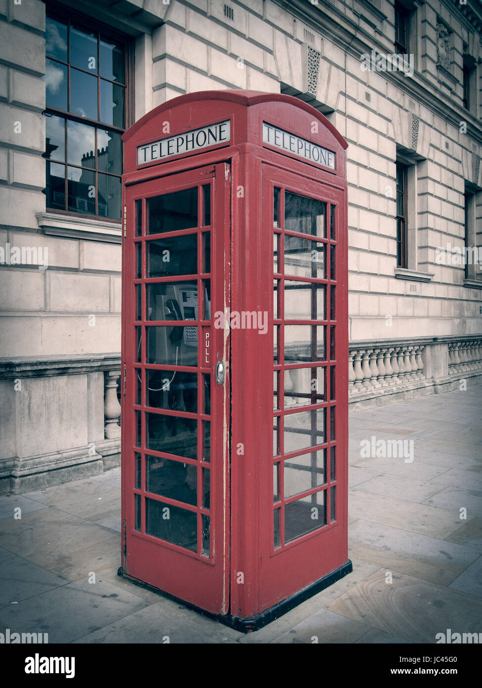 Vintage looking Traditional red telephone box in London UK Stock Photo ...