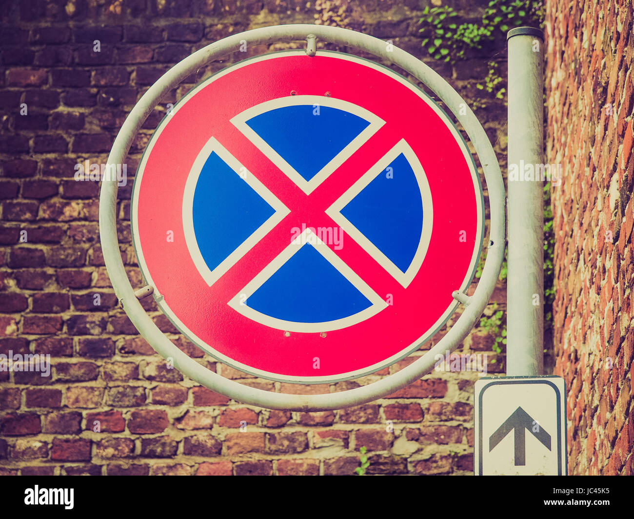 Vintage retro looking A road sign for a no parking area Stock Photo - Alamy