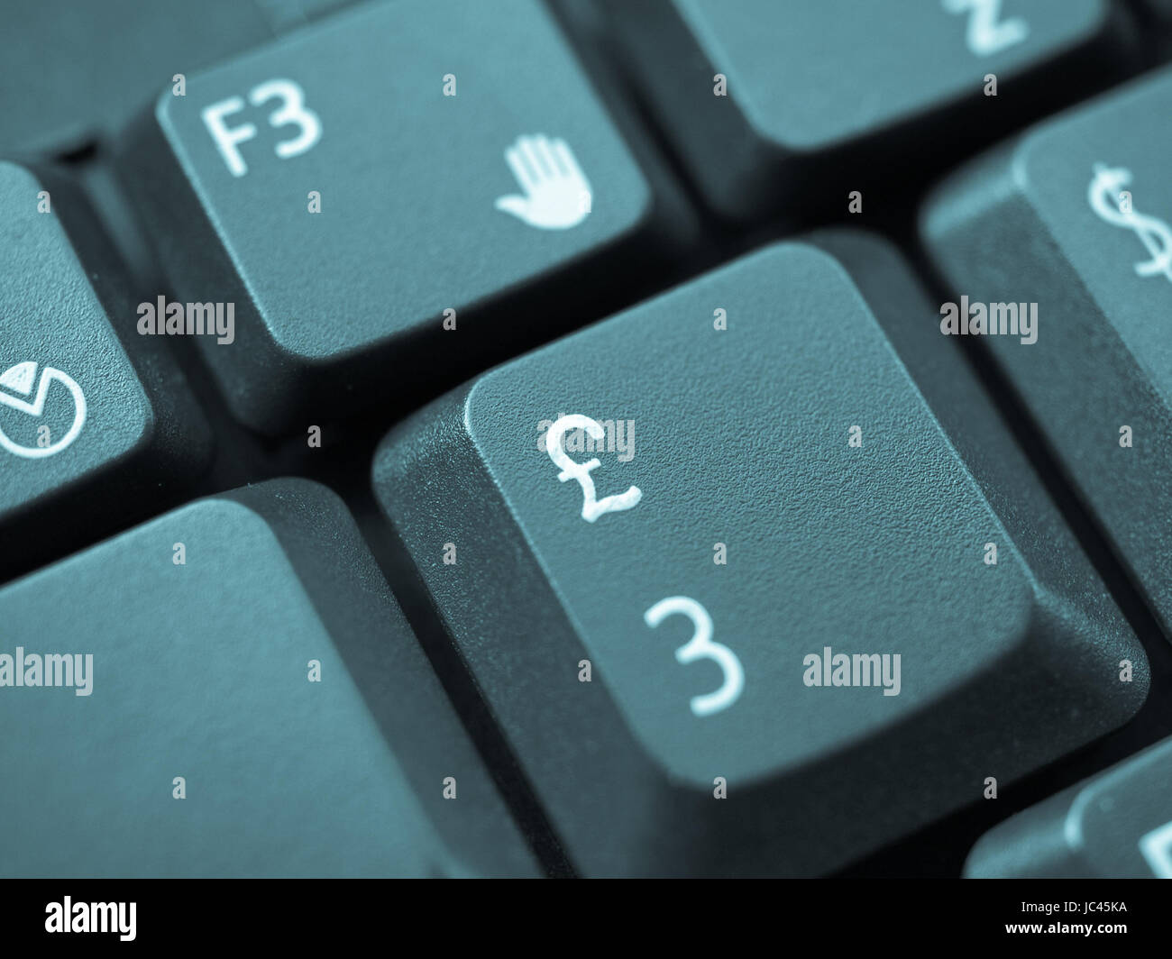 Detail of keys on a computer keyboard - cool cyanotype Stock Photo - Alamy